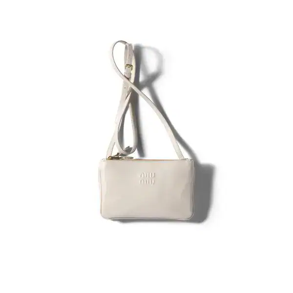 Miu Miu 牛革 ケース ミニチャームホワイト Miu Miu Leather Pouch - Chalk White | Editorialist